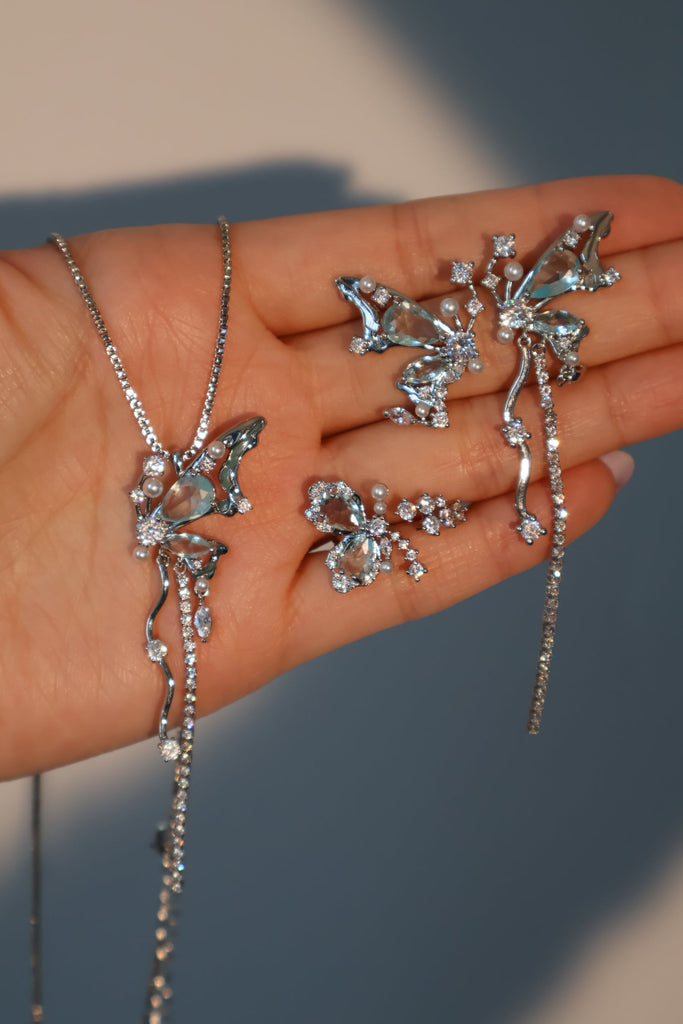 Platinum plated Blue Gem Butterfly Necklace – Cutethingscommin
